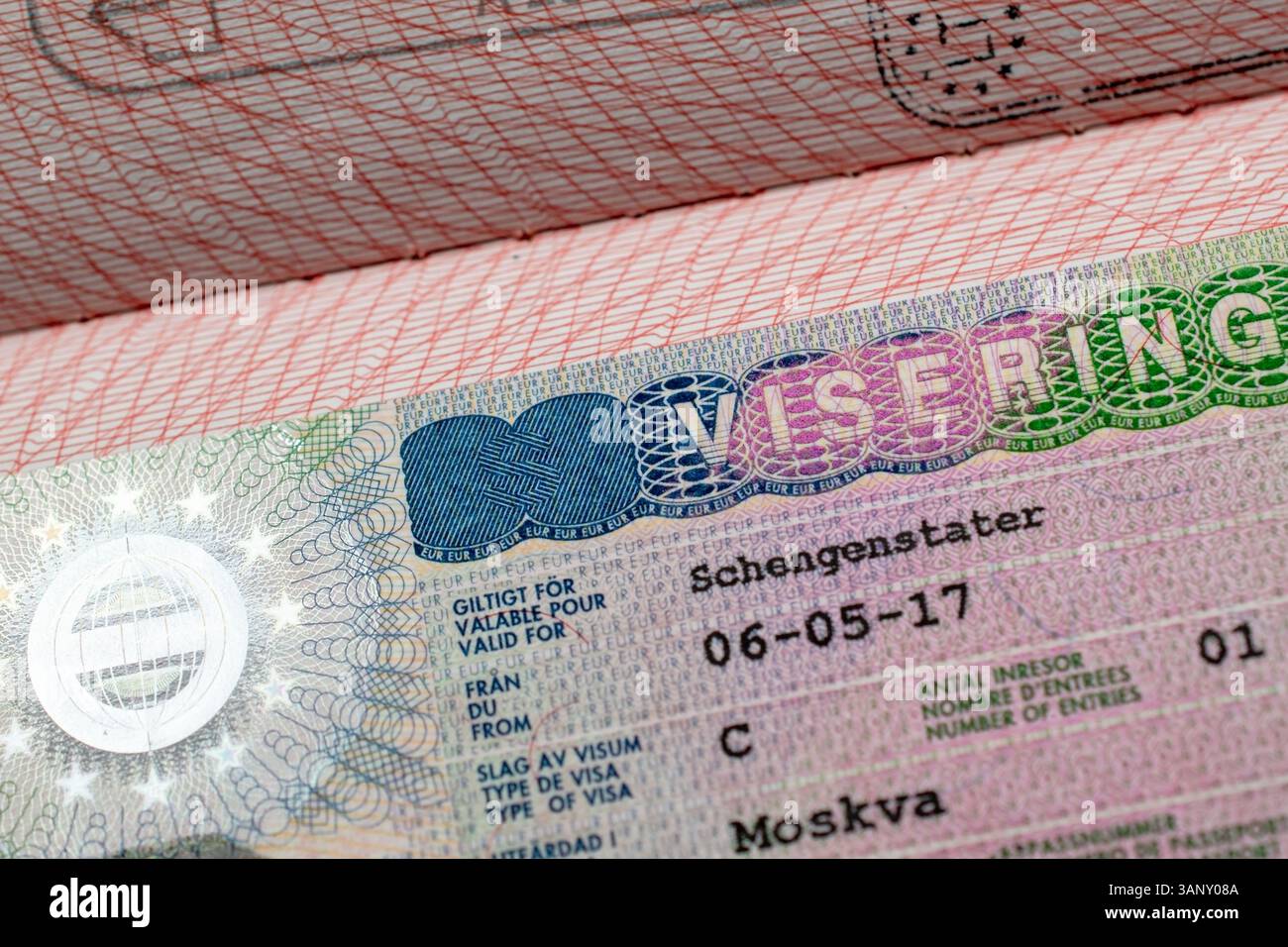 Close up of Swedish visa page in a passport, Schengen area document for travel and work ...