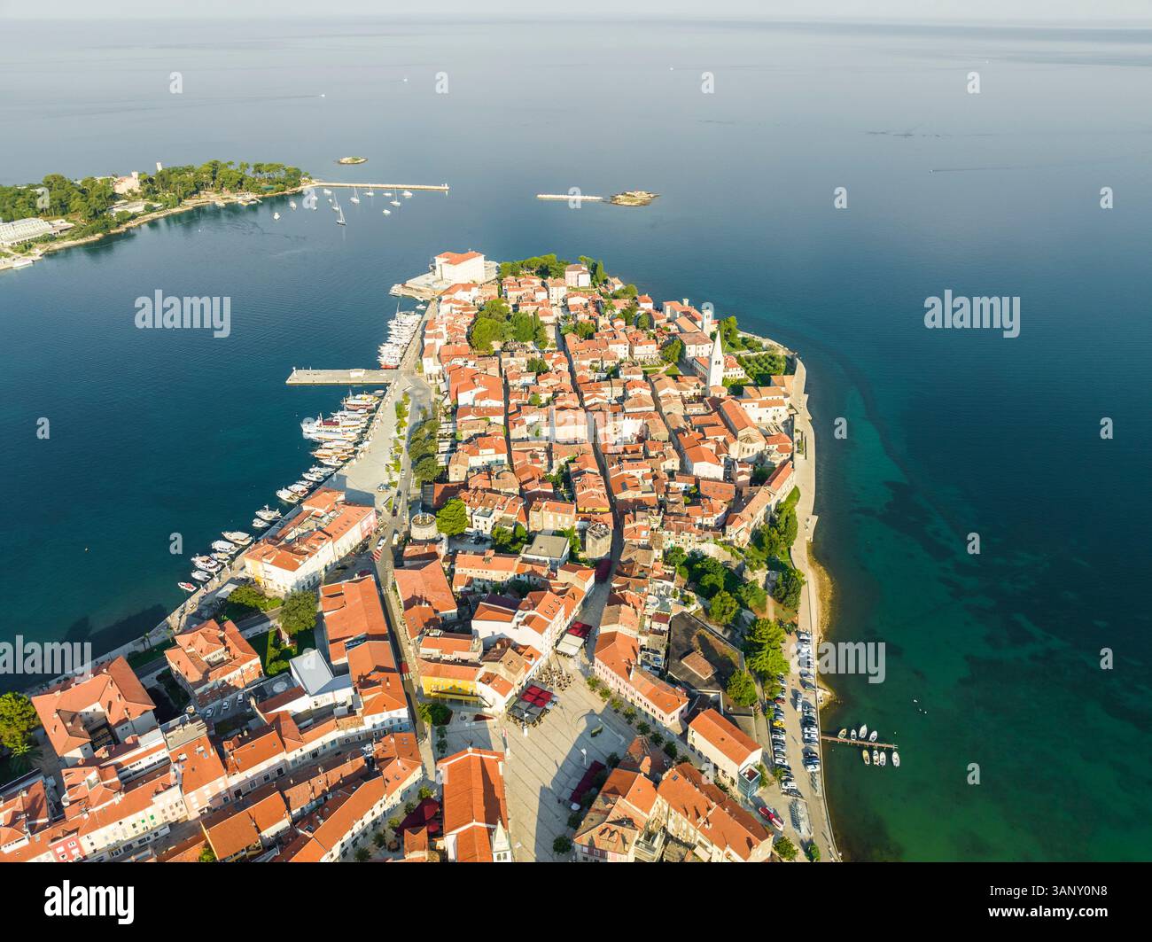 Aerial view of Porec at sunrise, a small town along the Adriatic Sea ...