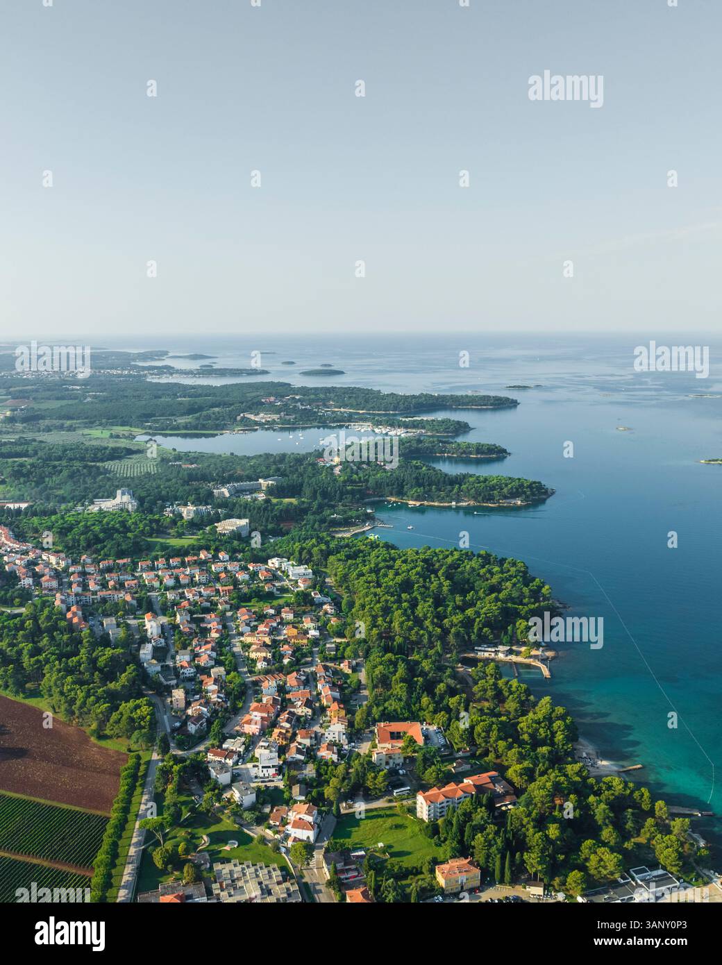 Aerial view of Porec residential area along the Adriatic Sea coastline ...