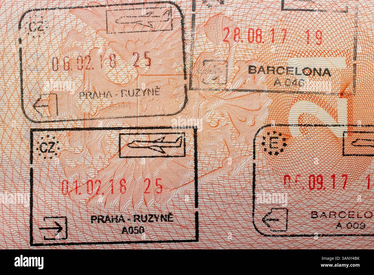 Open passport showing travel stamps from different countries, airport ...