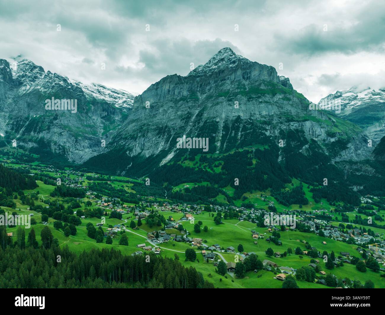 Aerial view of Bernese Alps in Grindelwald town in summertime, Swiss ...