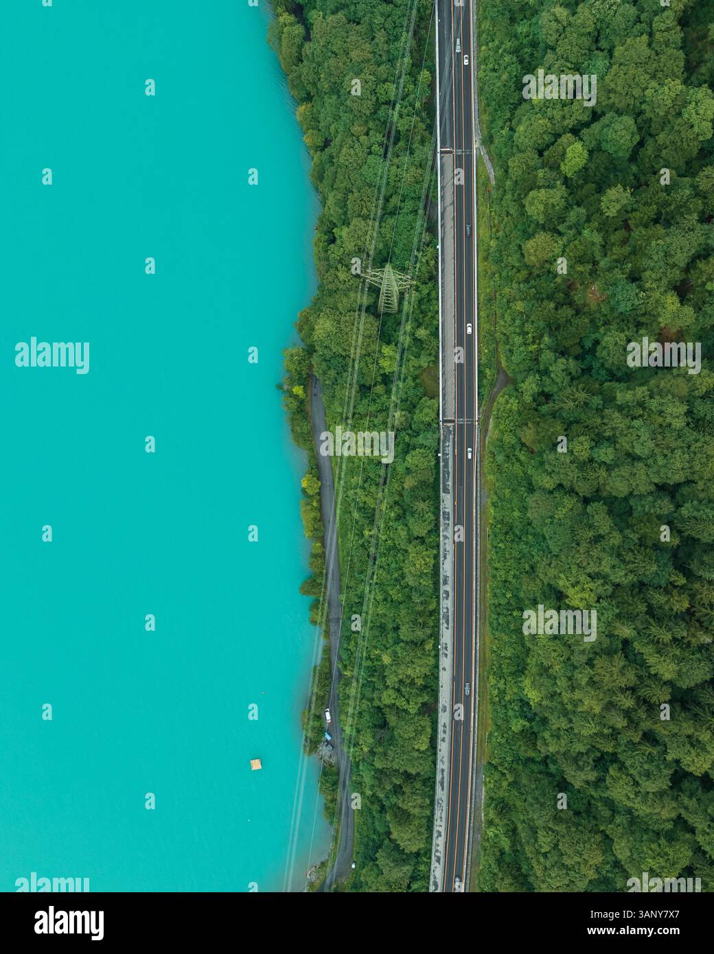 Aerial view of a road following the Brienzersee Lake coastline, Bonigen ...