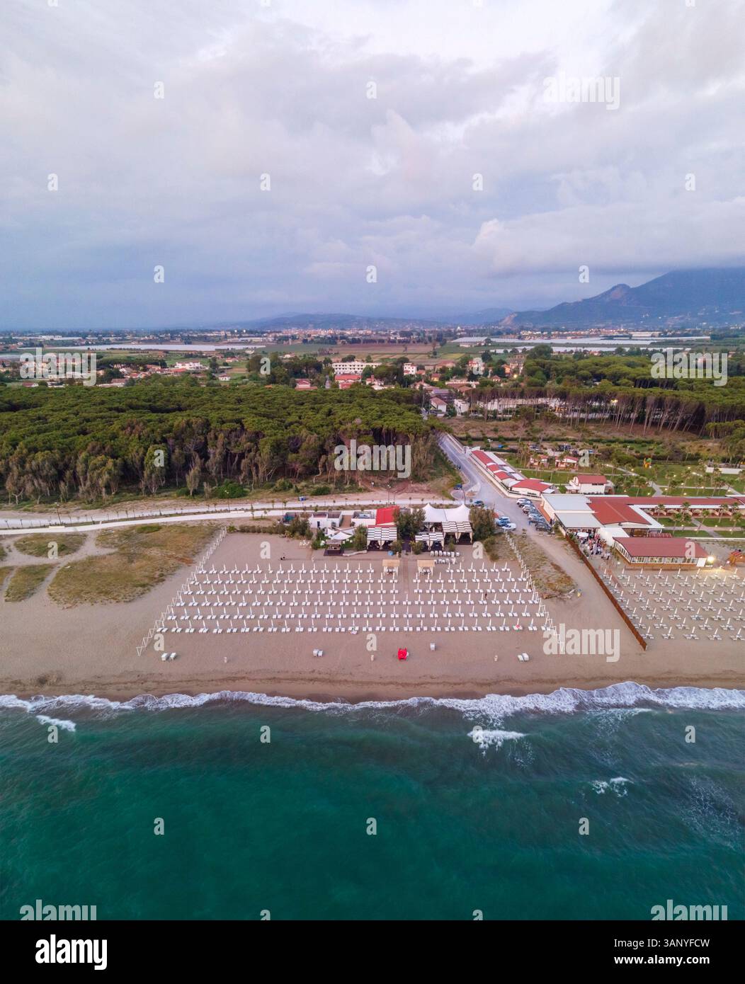 Aerial view of beach resorts along the coastline facing the ...
