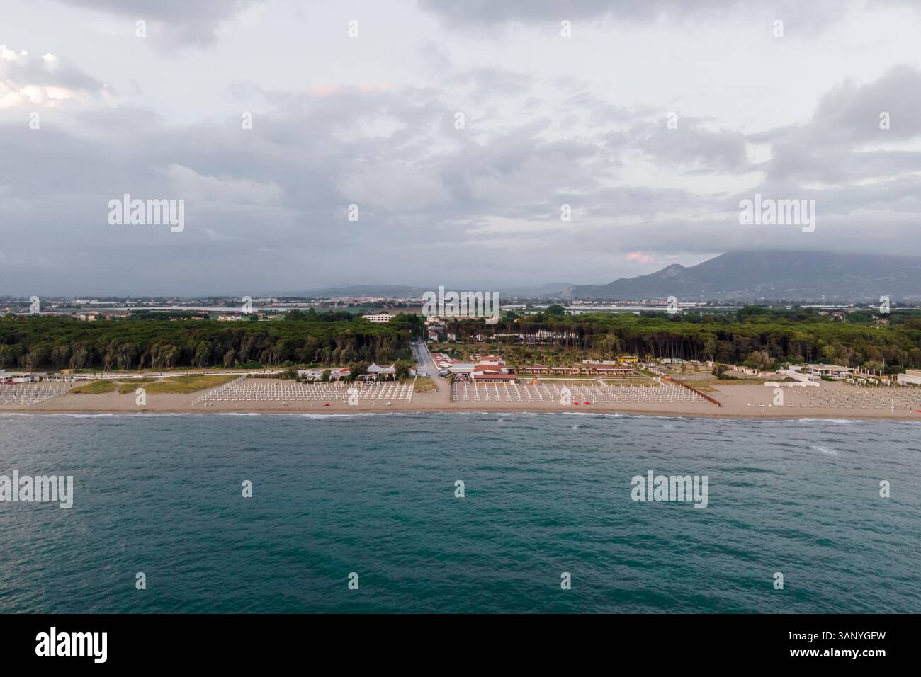 Aerial view of beach resorts along the coastline facing the ...
