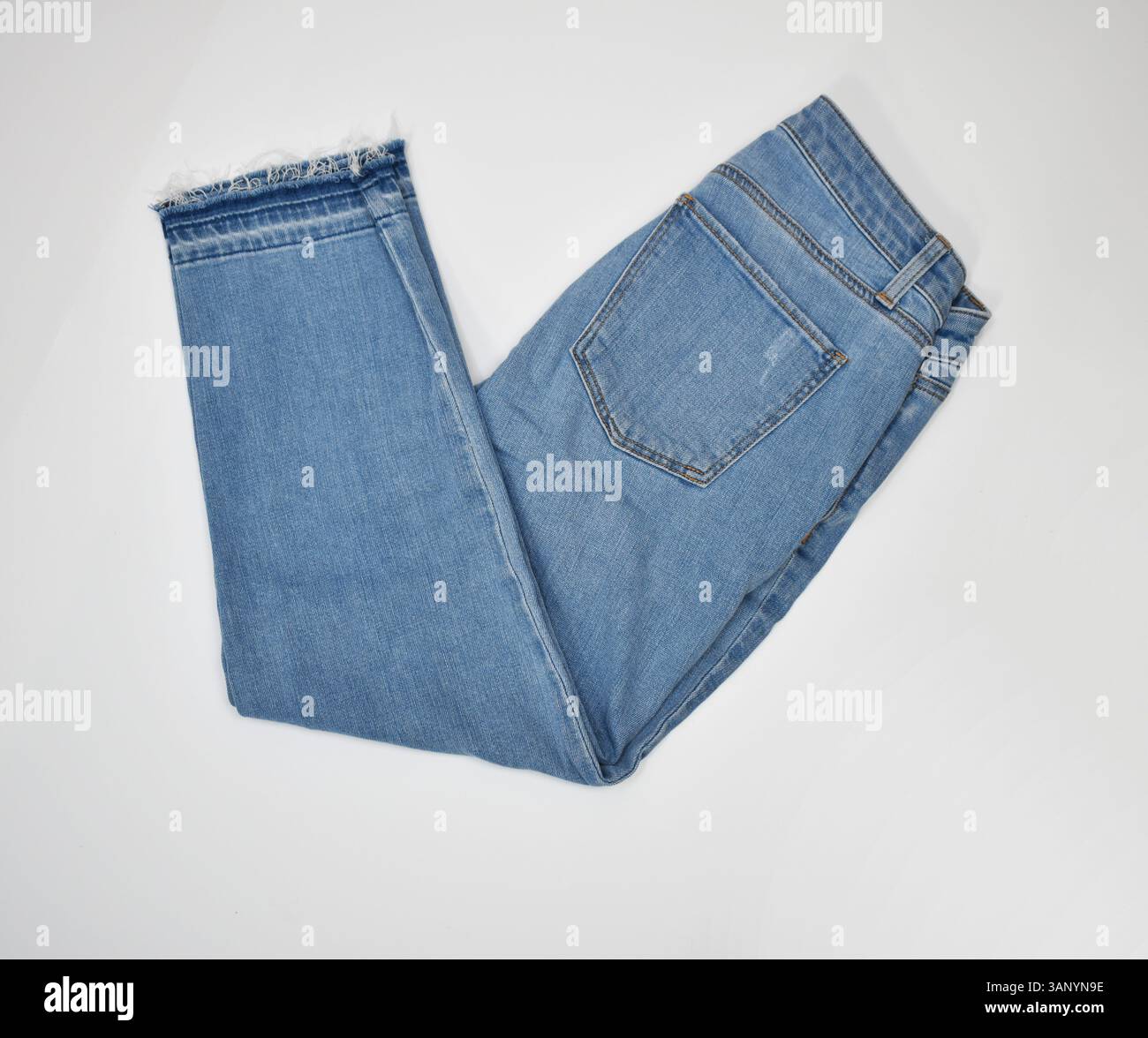 Blue jeans on white background Stock Photo - Alamy