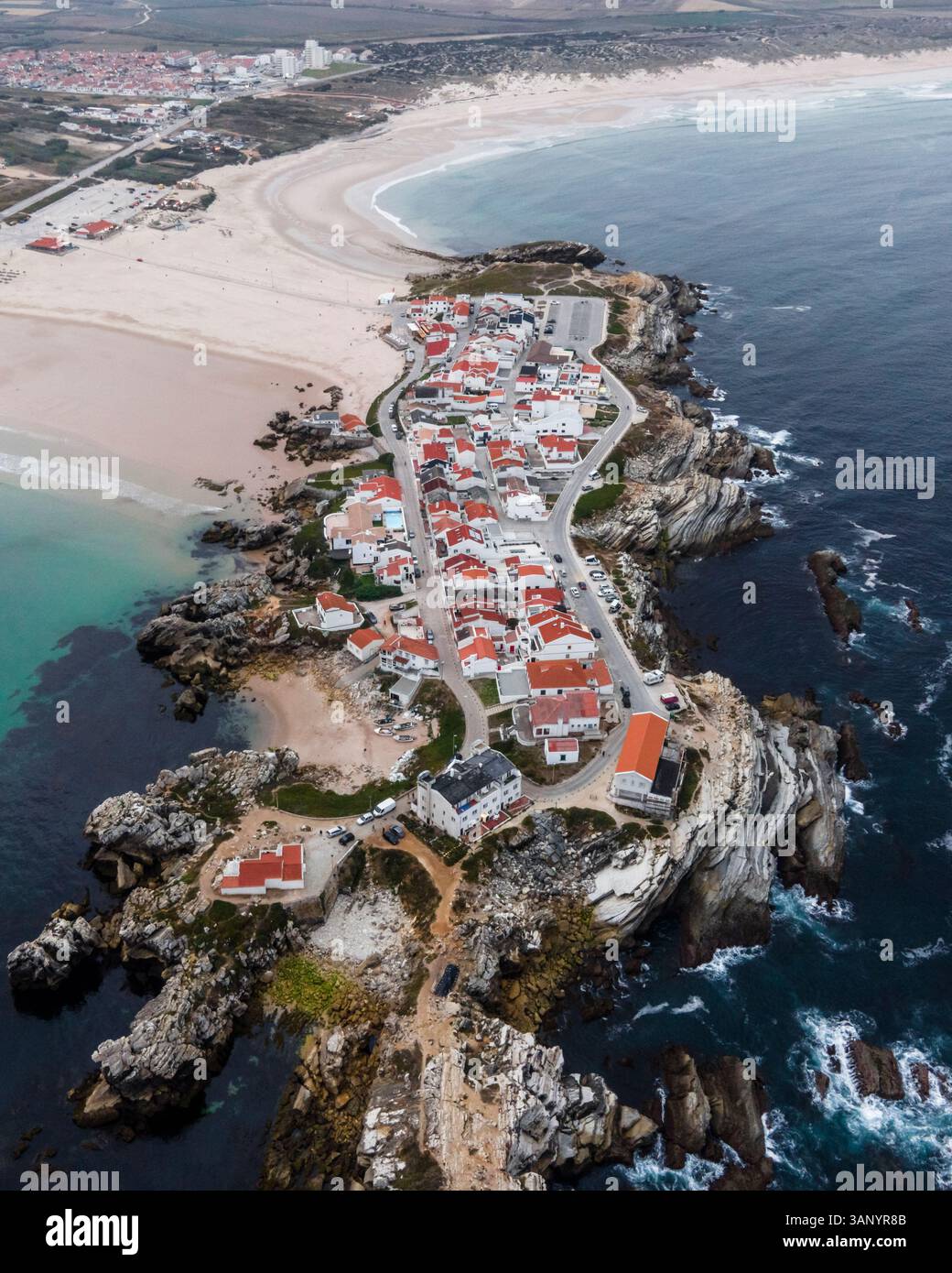 Aerial view of Baleal, a small town on a small island with high cliffs ...