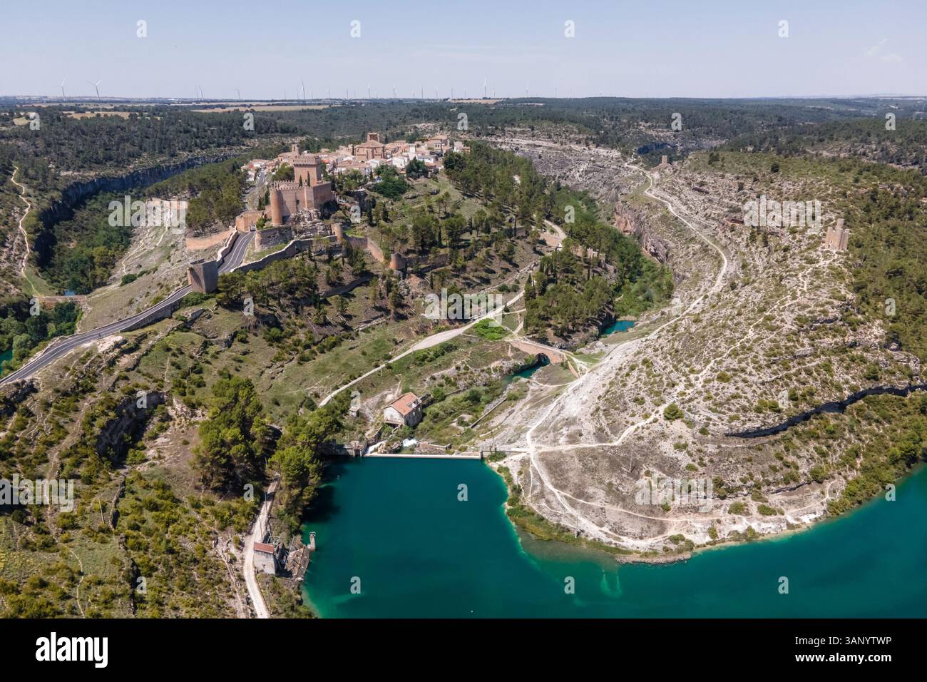 Aerial view of Alarcon, a medieval town with castle on top along the ...