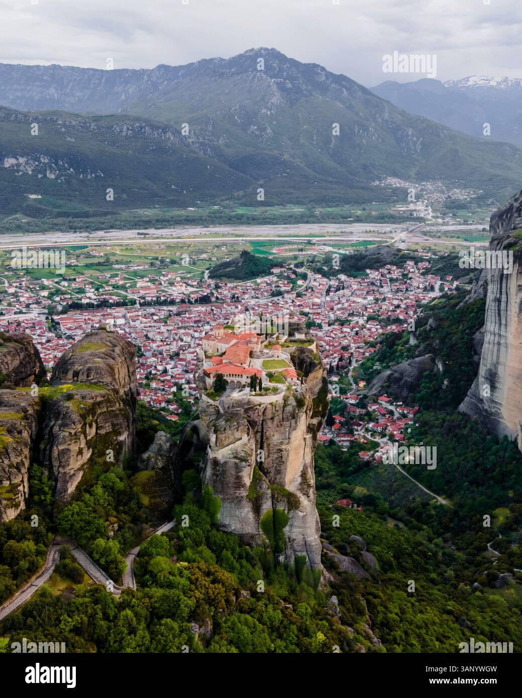 Aerial view of The Holy Trinity Orthodox Monastery with Kalabaka town ...