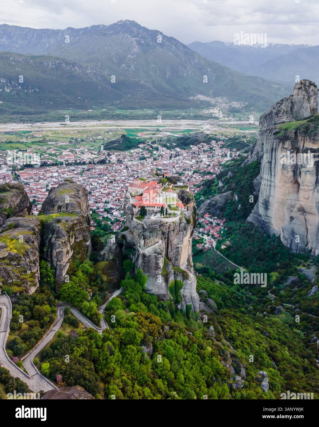 Aerial view of The Holy Trinity Orthodox Monastery with Kalabaka town ...