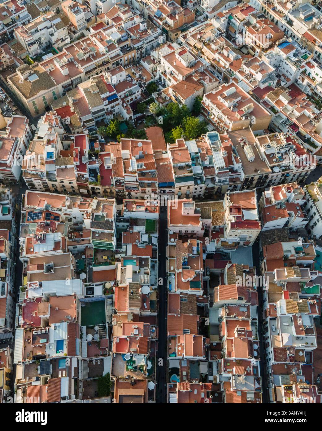 Aerial top down view of Sitges downtown with red rooftops and ...