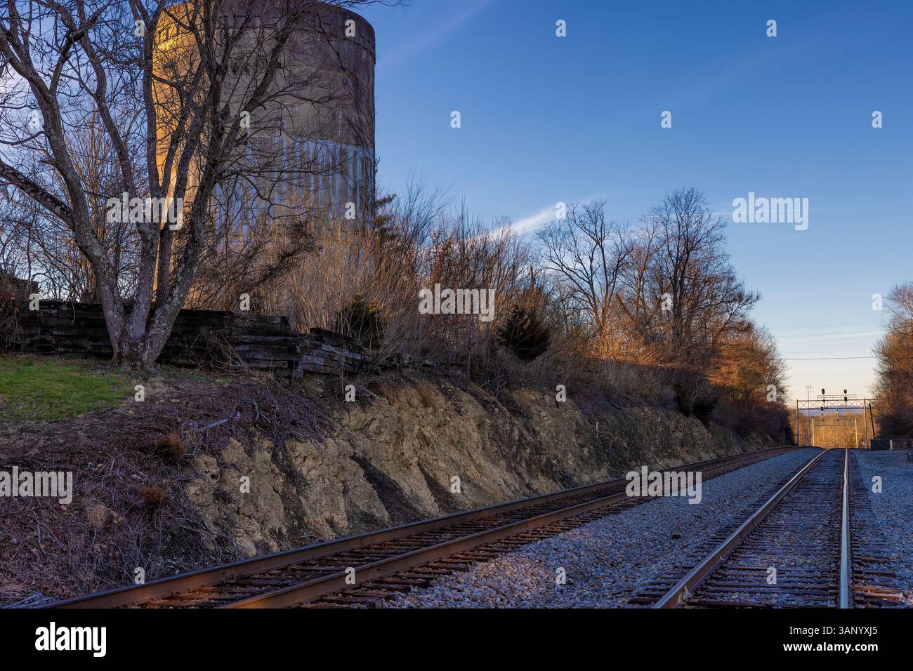 Southern Railway Water Tower sits above the railroad tracks that run ...