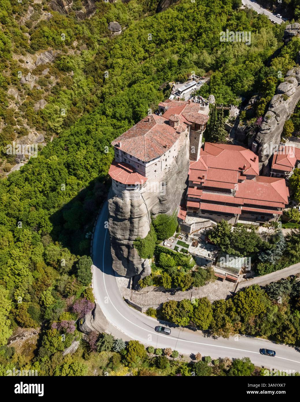 Aerial view of Holy Monastery of Rousanos on a natural pillar rock formation in Meteora, Trikala ...