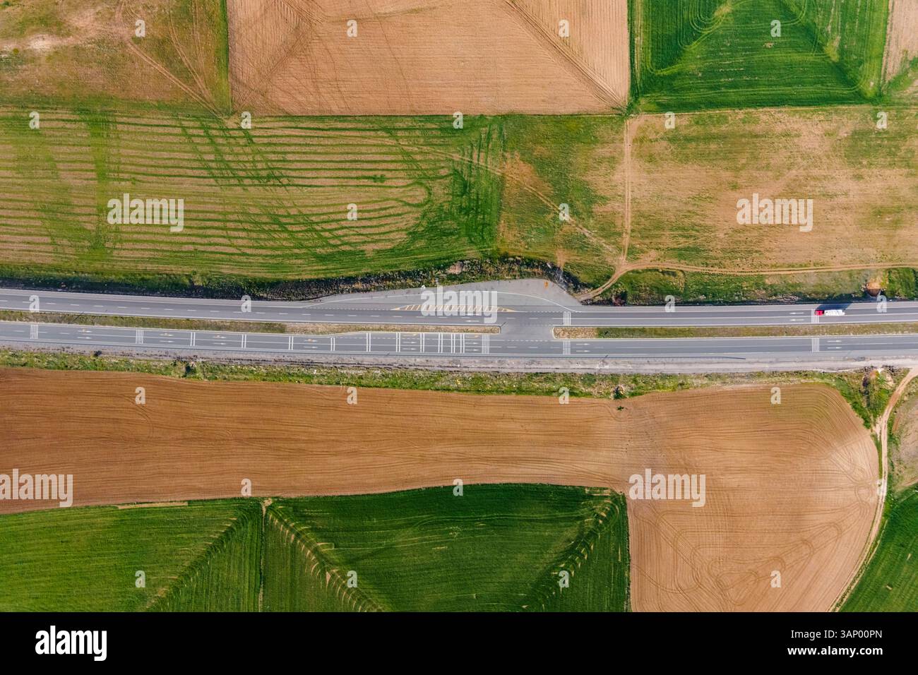 Aerial view of a truck driving on the highway along Lake Tuz in Central ...