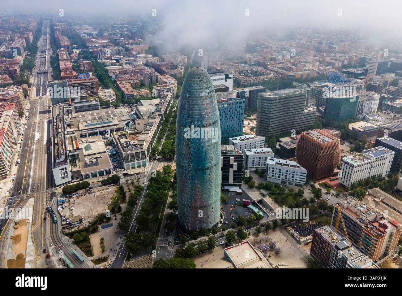 Aerial view of Torre Glories, a landmark skyscraper in Barcelona ...
