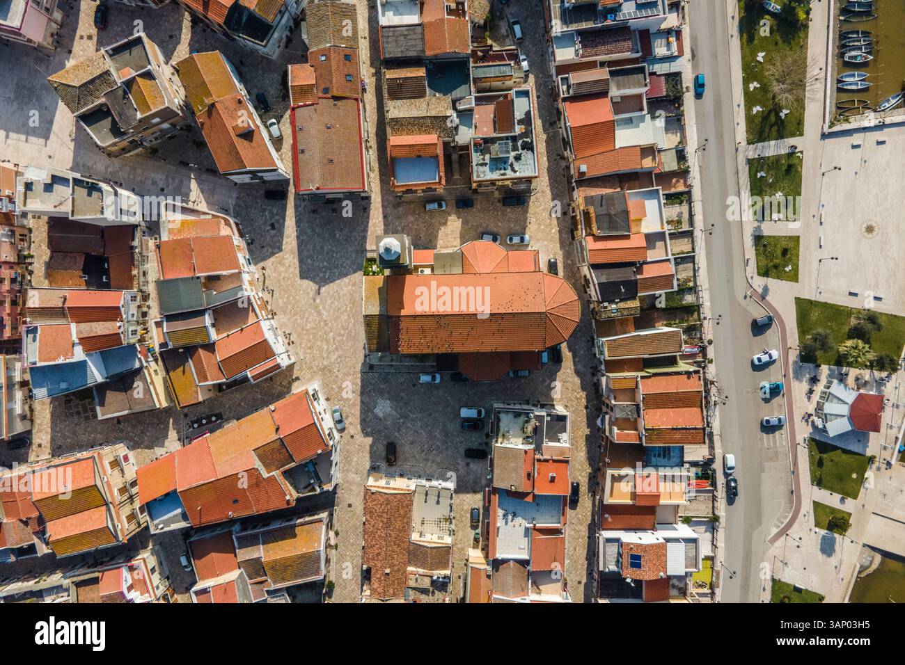 Aerial view of Lesina town church along Lesina Lake on Gargano natural ...