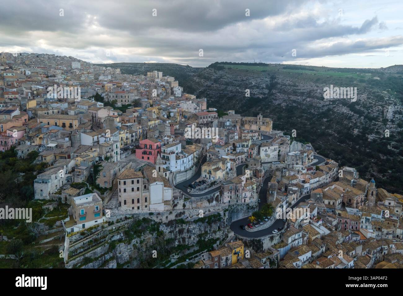 Aerial view of Ragusa, a medieval town on the hillside at sunset in ...