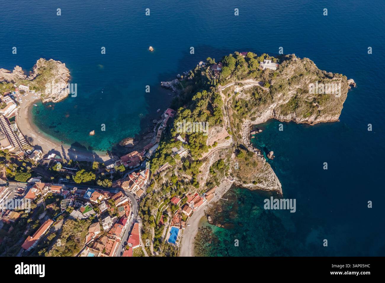 Aerial view of the Blue Cave (Grotta Azzurra) on the promontory along ...