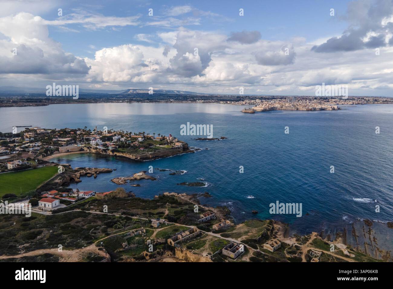 Aerial view of Punta della Mola with Ortigia island on background in ...