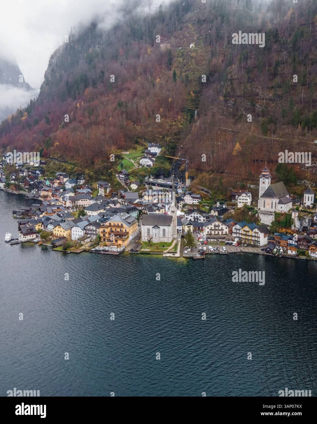 Aerial view of Hallstatt along the Hallstatter See in winter, Upper ...