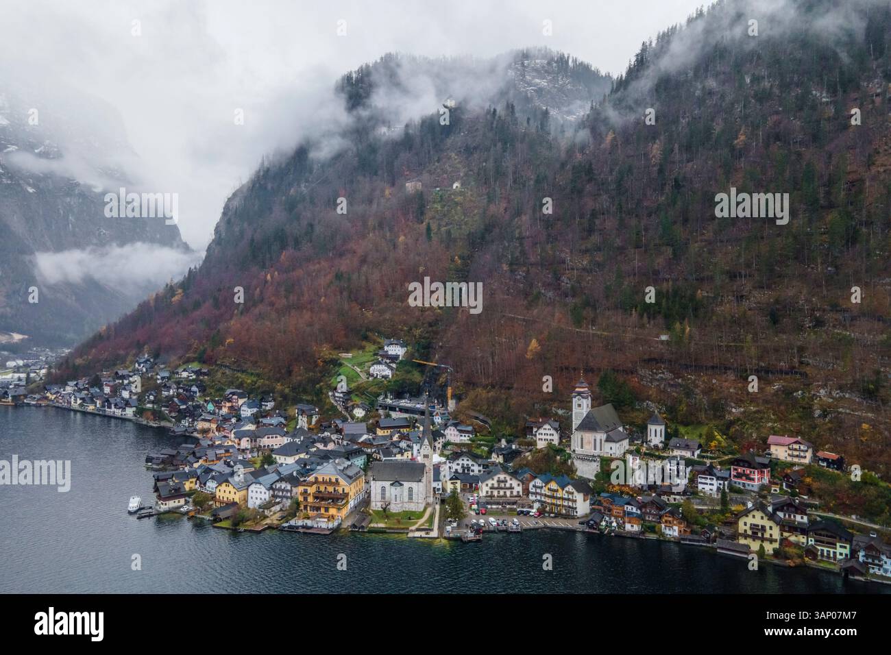 Aerial view of Hallstatt along the Hallstatter See in winter, Upper ...