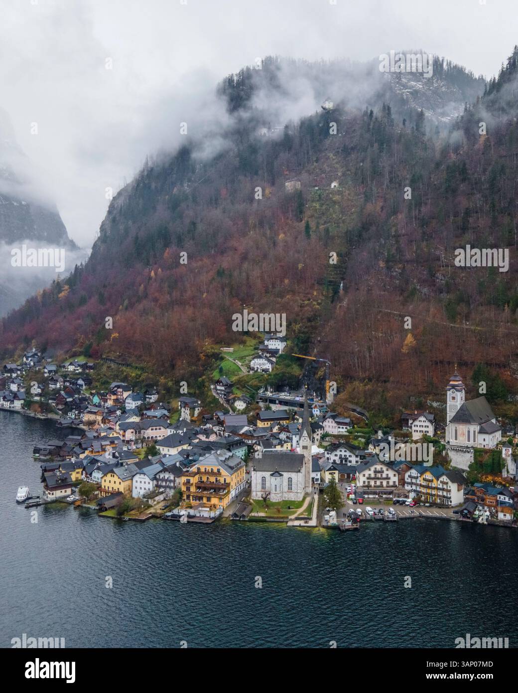 Aerial view of Hallstatt along the Hallstatter See in winter, Upper ...