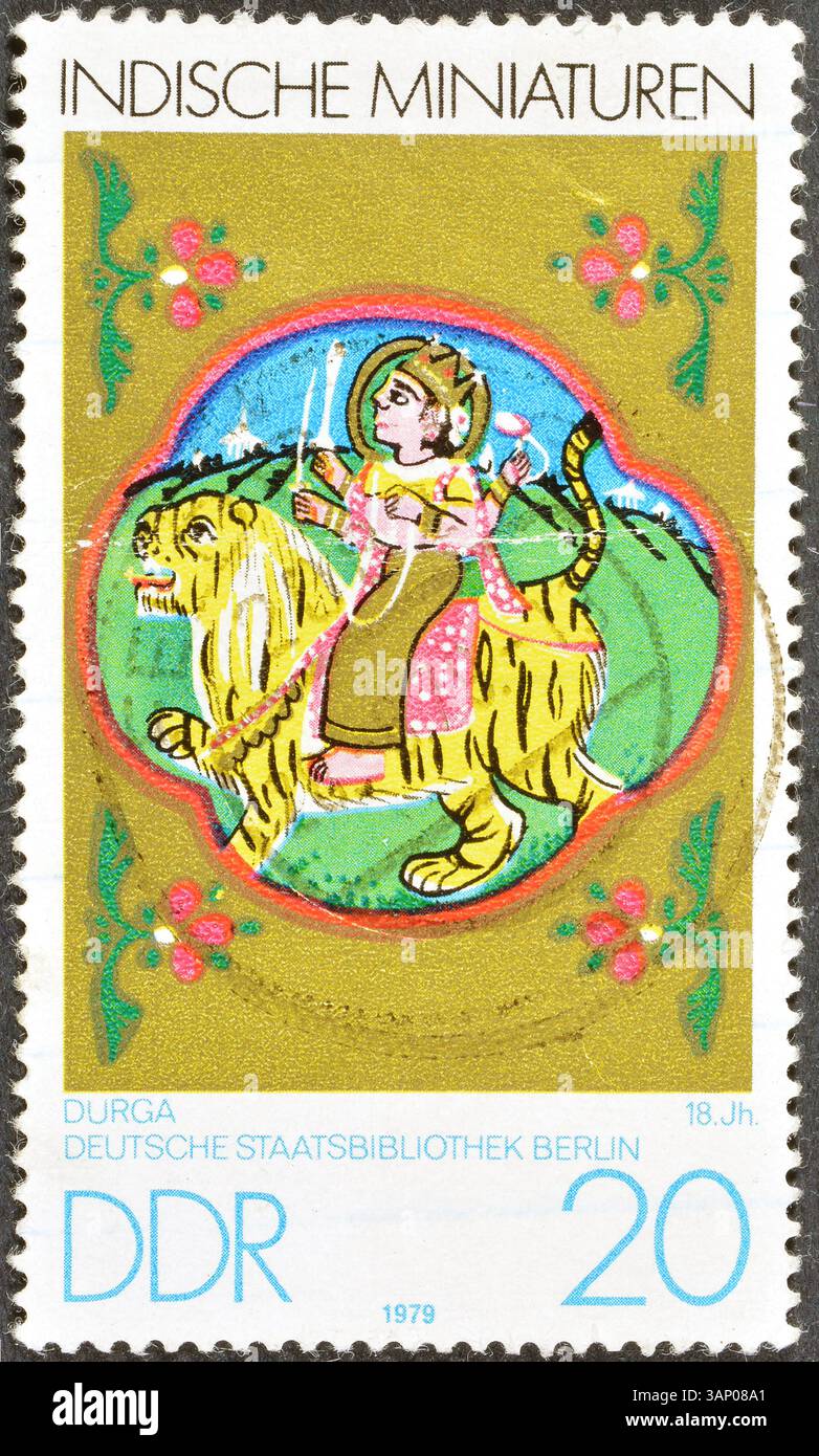 Cancelled postage stamp printed by East Germany, that shows Indian ...