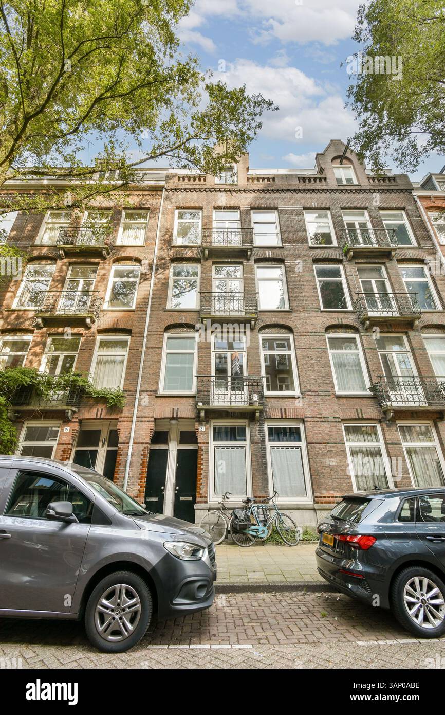 A picturesque urban scene featuring a classic apartment building ...