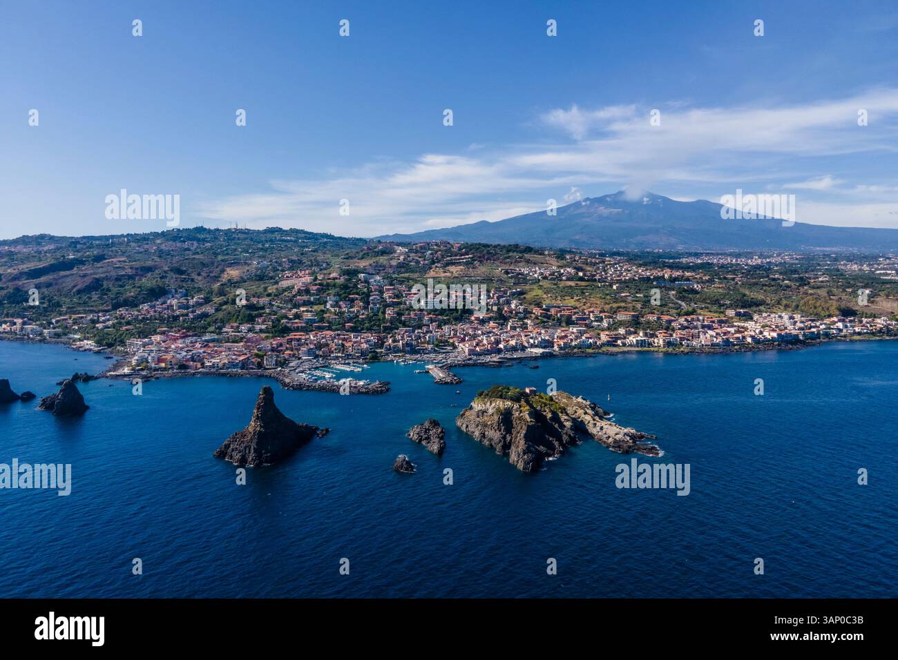 Aerial view of Aci Trezza, the Ciclopi Islands and the Etna Volcano ...