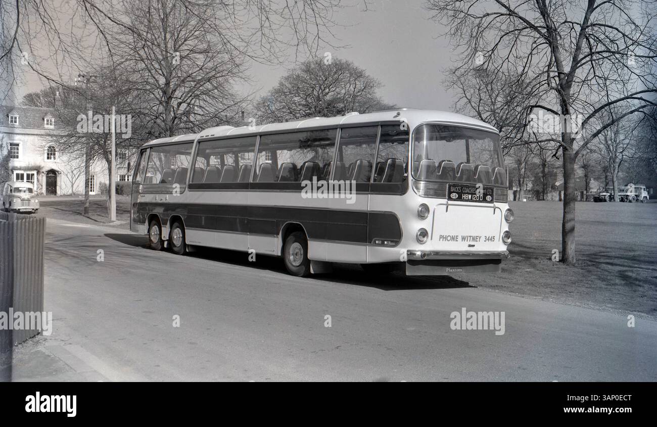 1960s, historical, parked beside a village square, a coach of Back's ...