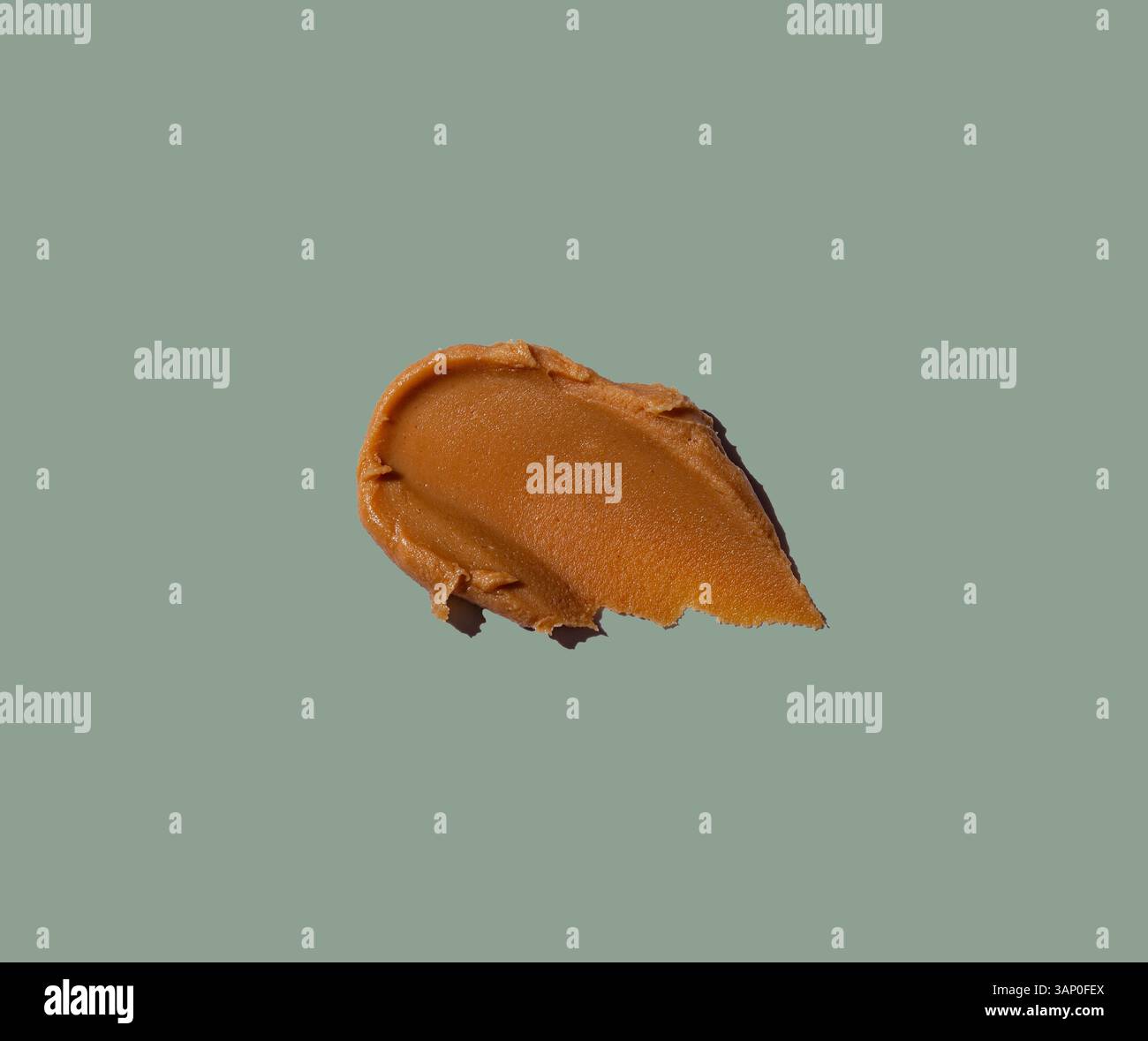 Peanut butter texture background Stock Photo - Alamy