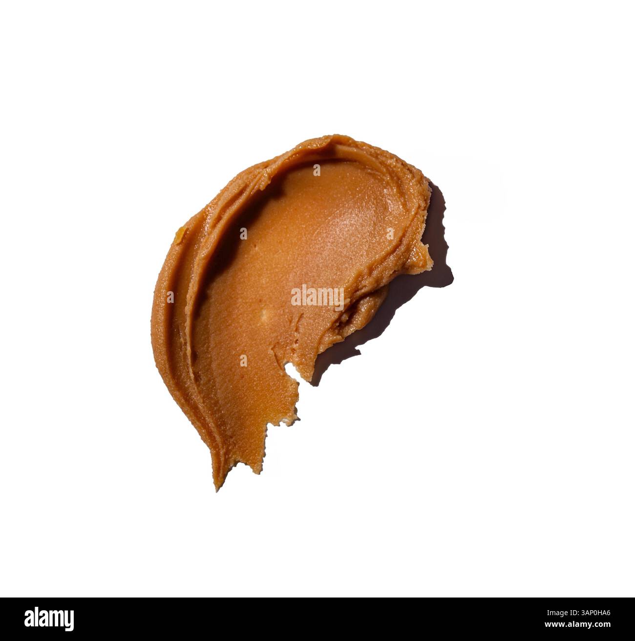 Peanut butter texture background Stock Photo - Alamy