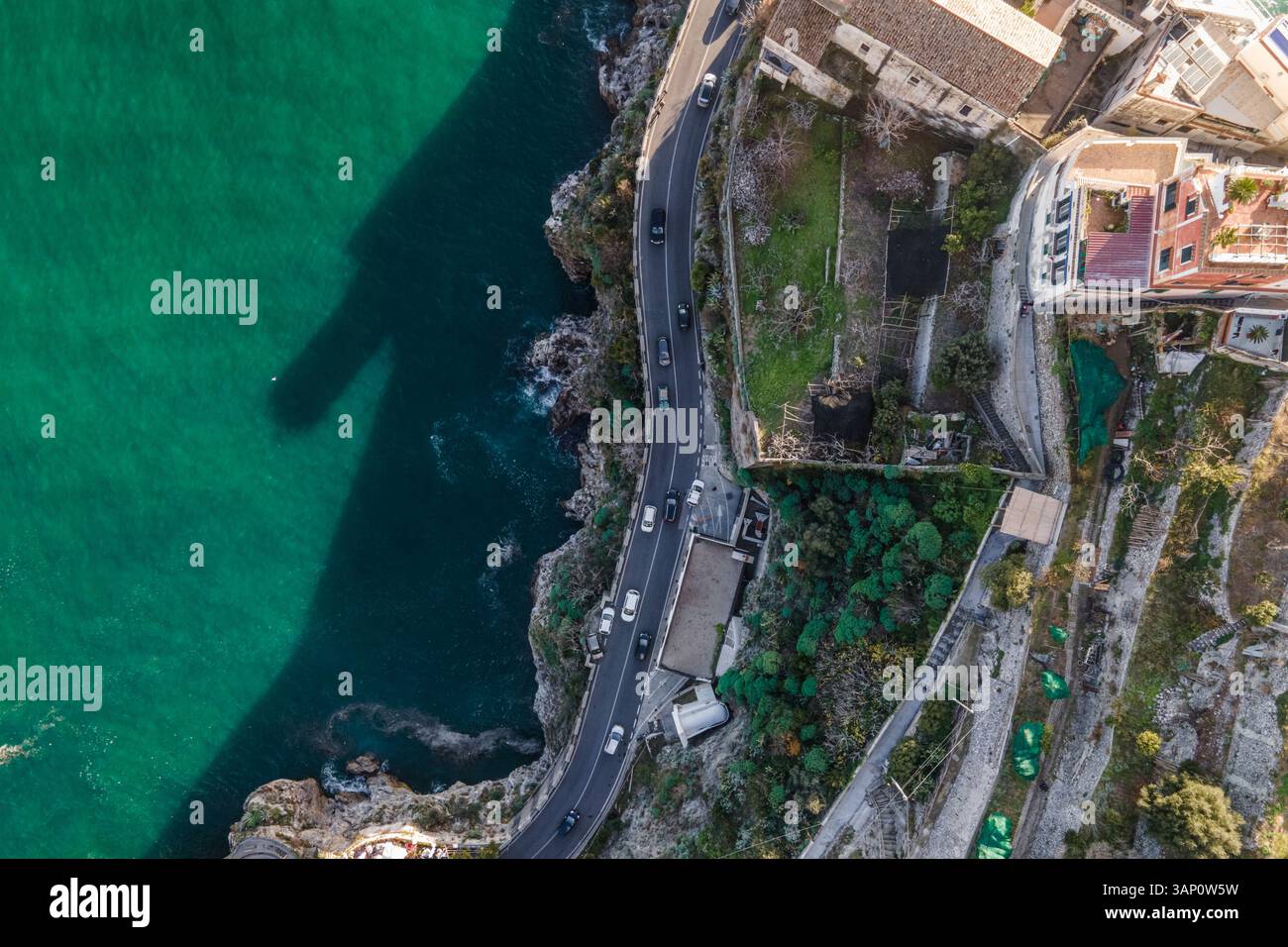 Aerial view of vehicles driving on the Amalfi drive, a scenic road near ...