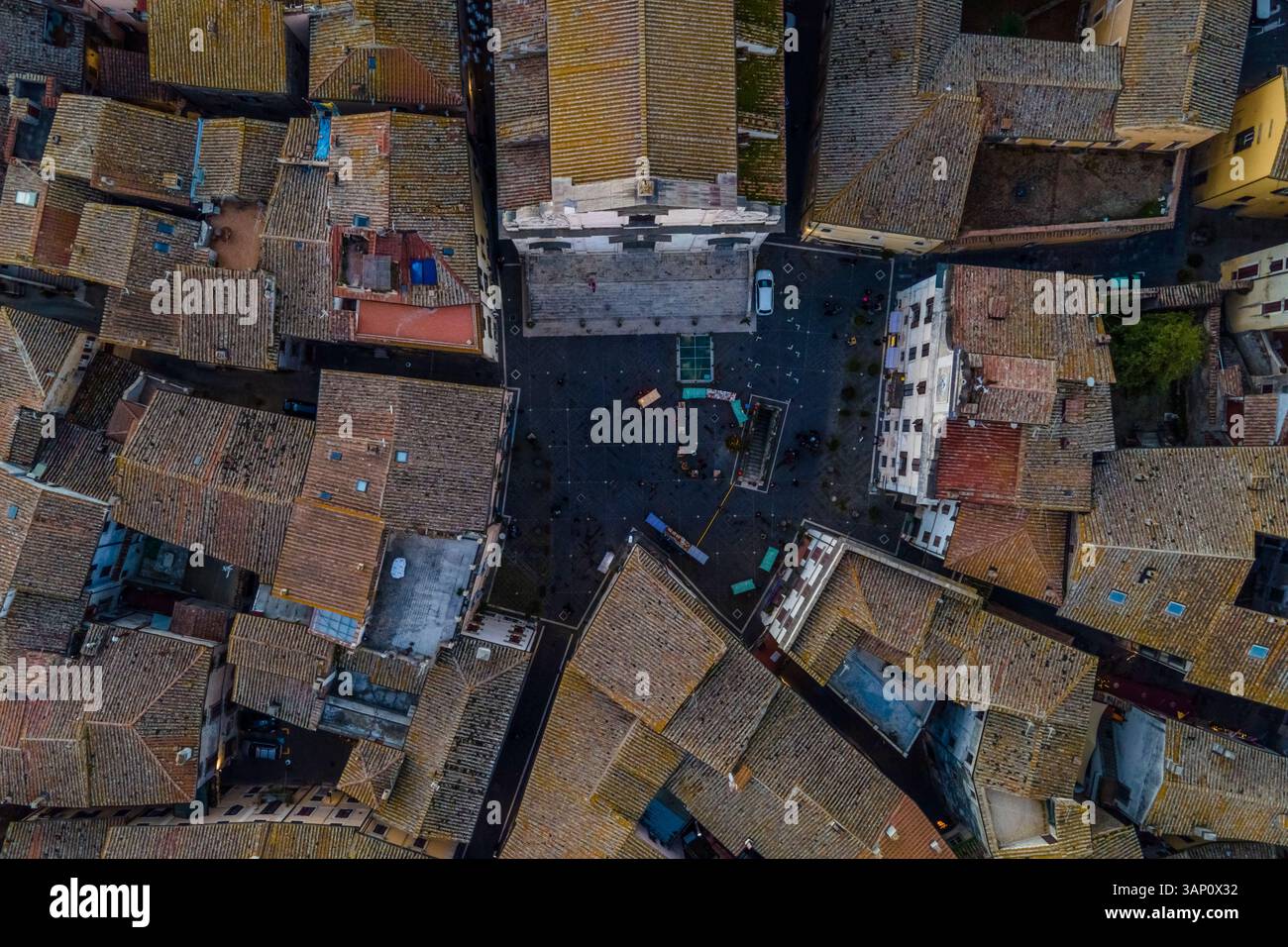 Aerial view of Orte town square, a small town on hilltop at sunset ...