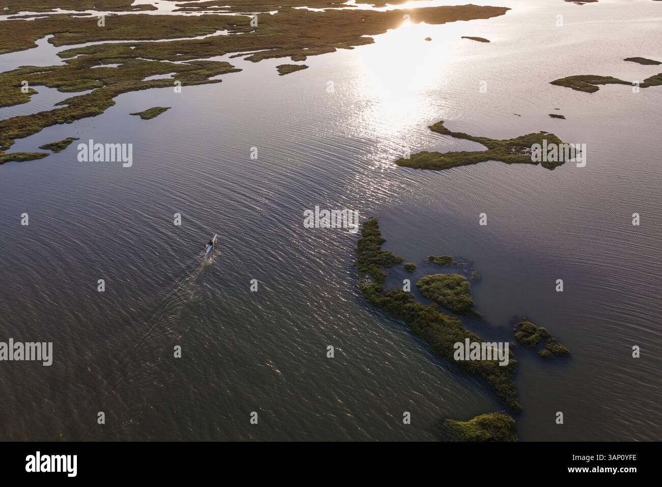 Aerial view of a person doing kayak in a lagoon along the Tagus river ...