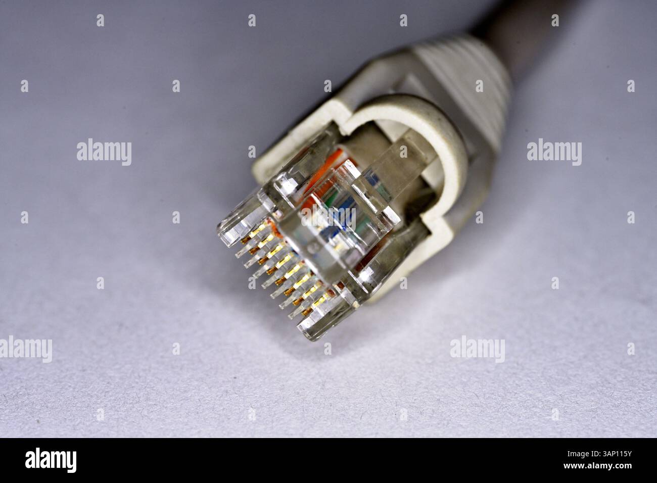 RJ45 plug with moulded on cover as used in wired Ethernet, some phone ...
