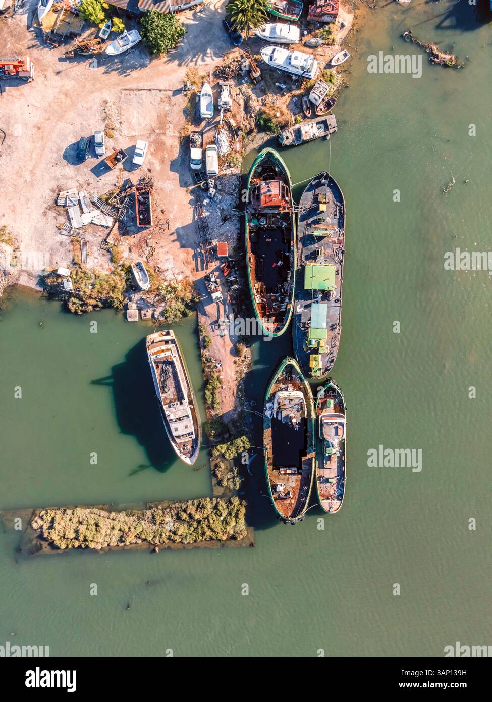 Aerial view of a shipyard along the lagoon in Amora, Setubal, Portugal ...