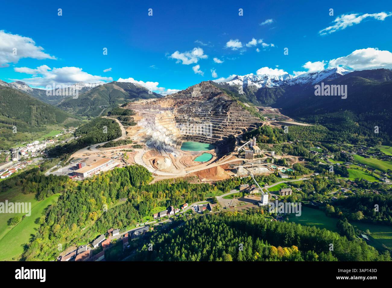 Aerial view of the industrial iron ore mine in a beautiful mountain ...