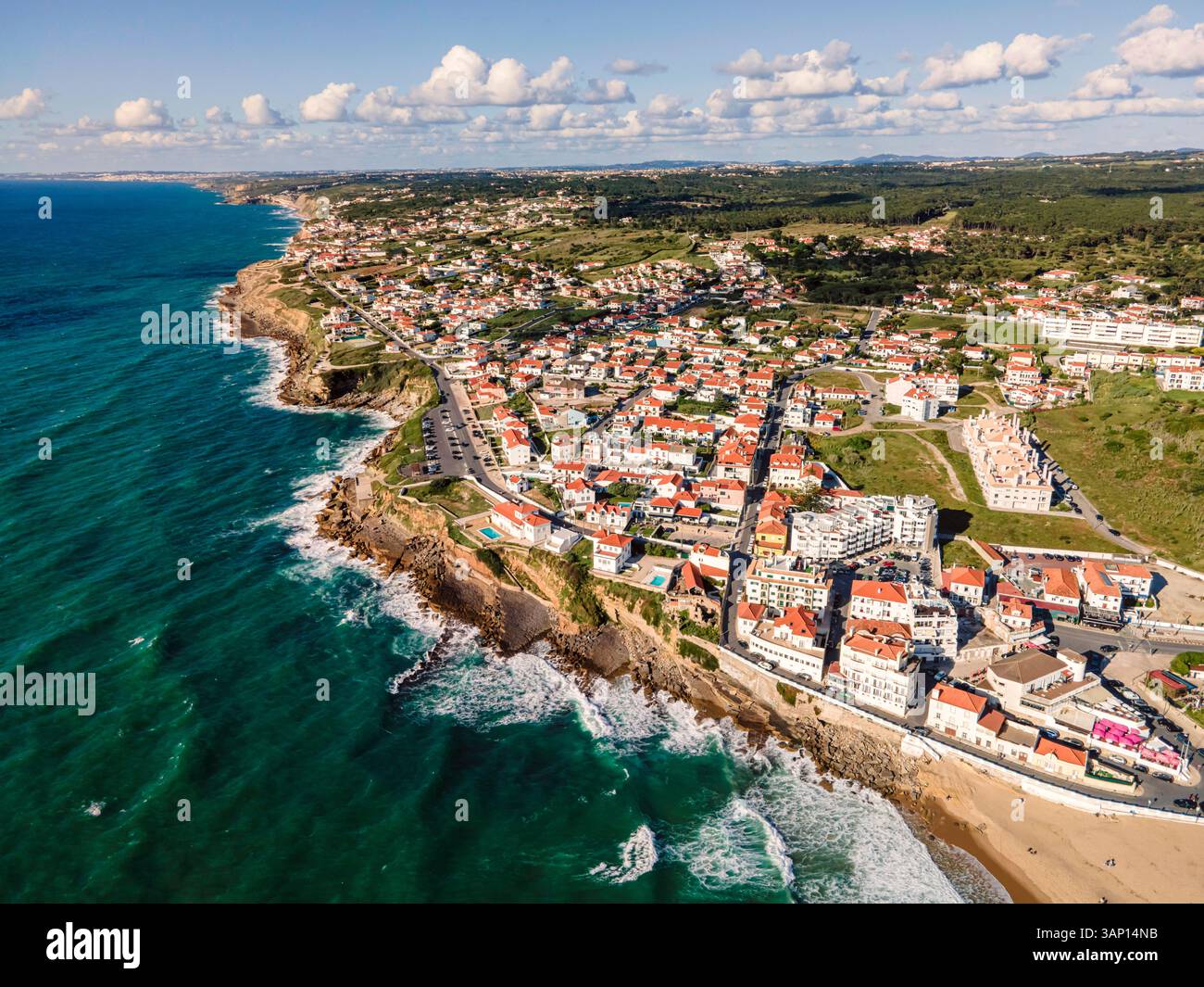 Aerial view of Praia das Macas little township along south Portuguese ...