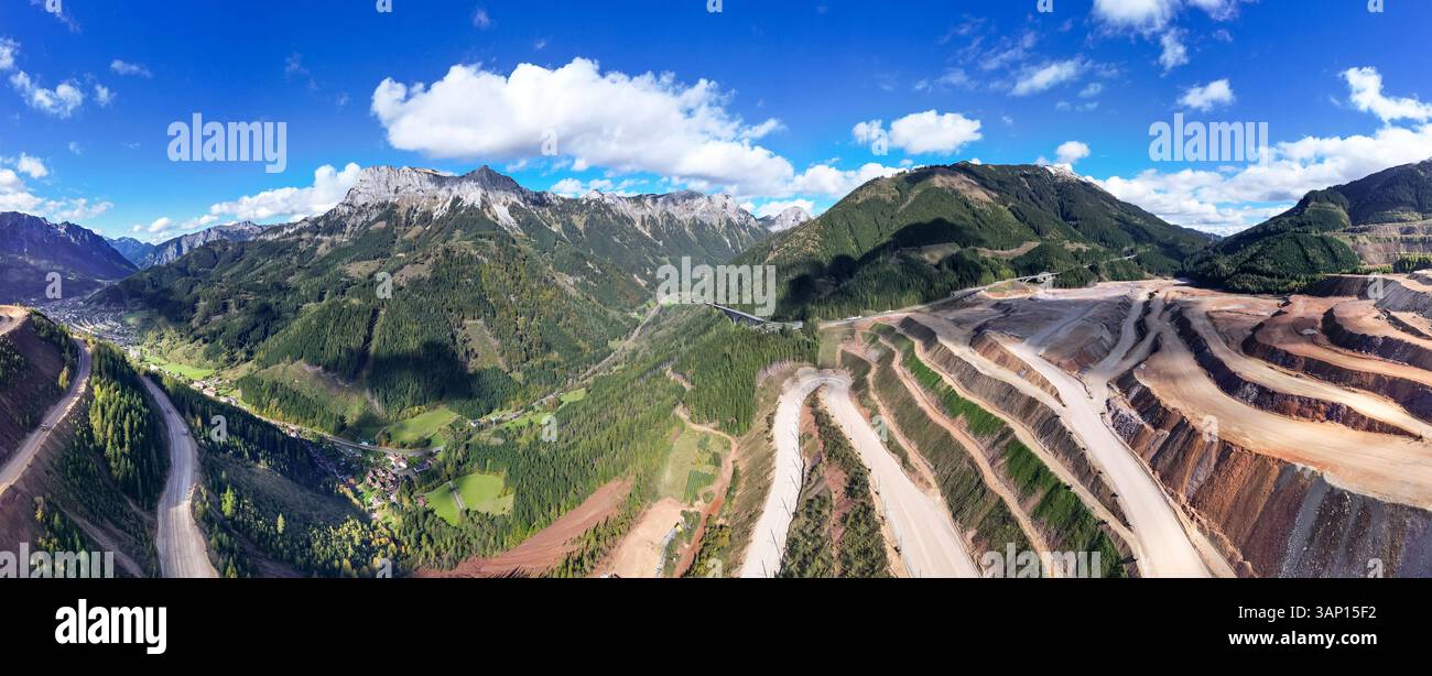 Aerial view of scenic mountain landscape with iron ore mine and stone ...