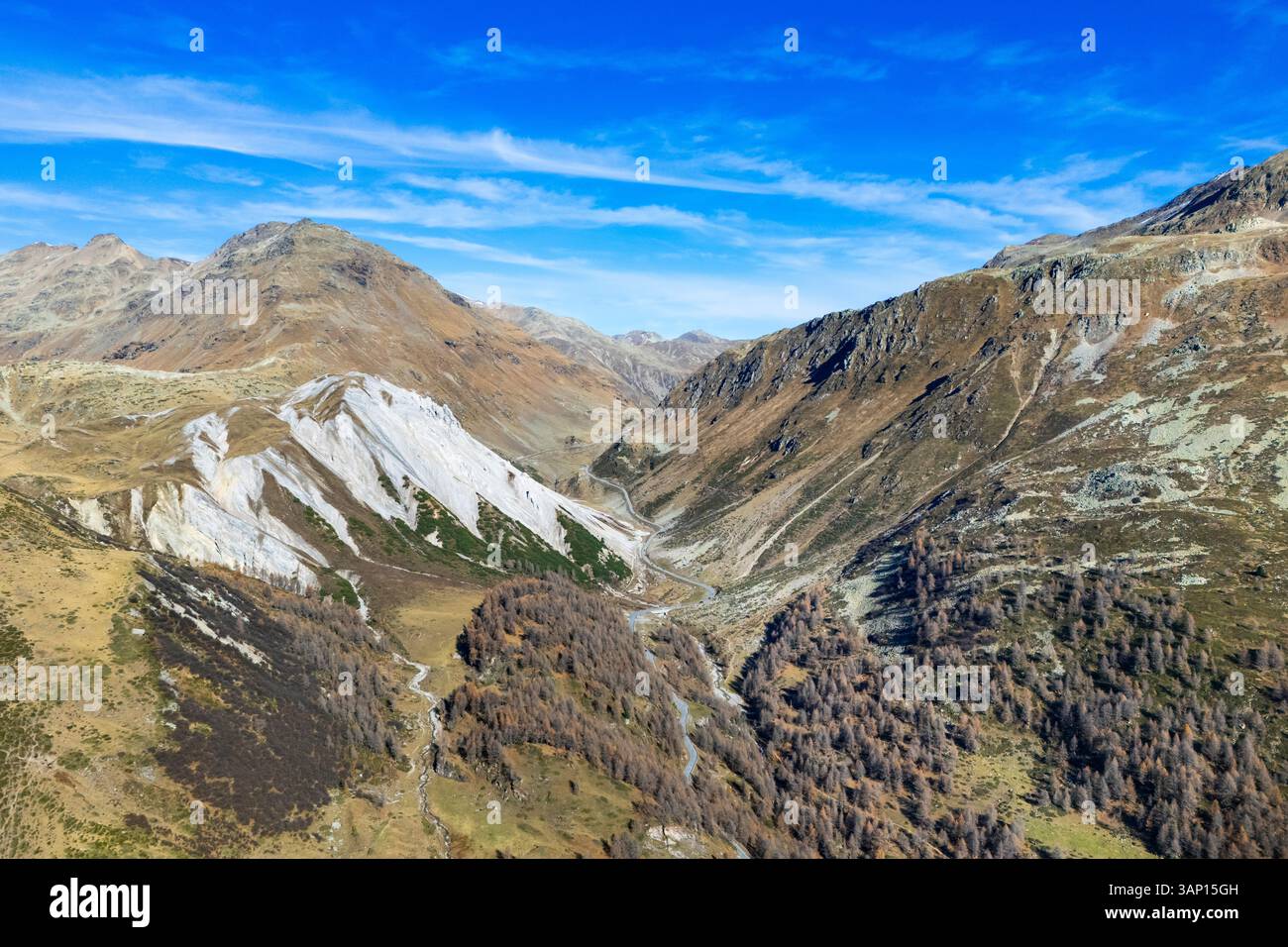 Aerial view of a mountain pass road in a beautiful alpine landscape ...