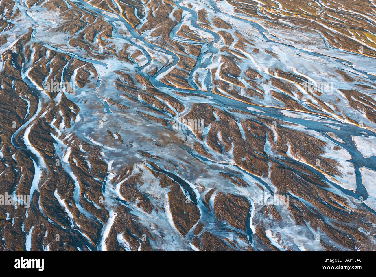Aerial view of abstract river veins in a frozen river with beautiful ...