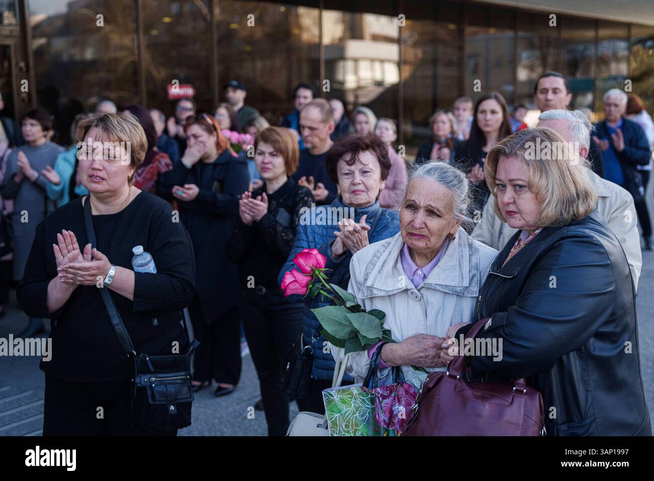 Mother Natalia cries while people applaud to her daughter Olena Kohut ...