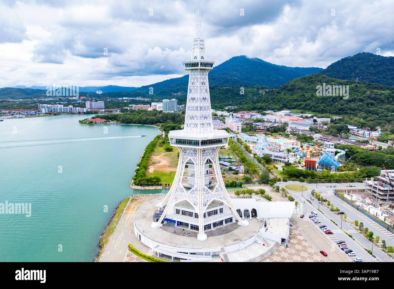 Aerial view of maha tower surrounded by mountains and water in a ...