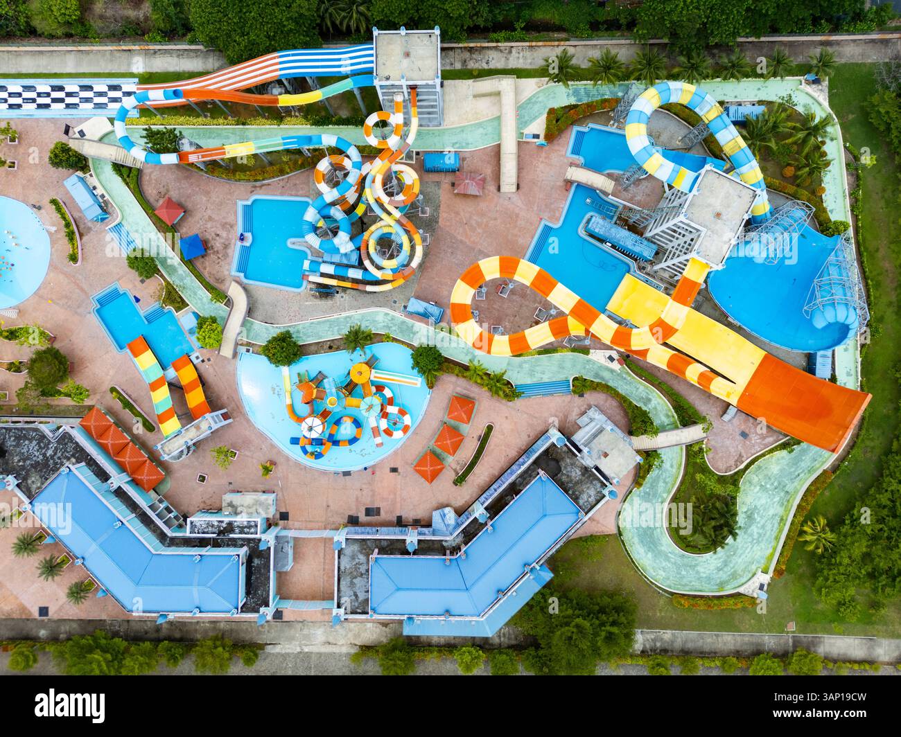 Aerial view of colorful water park with slides and swimming pools, Kuah ...