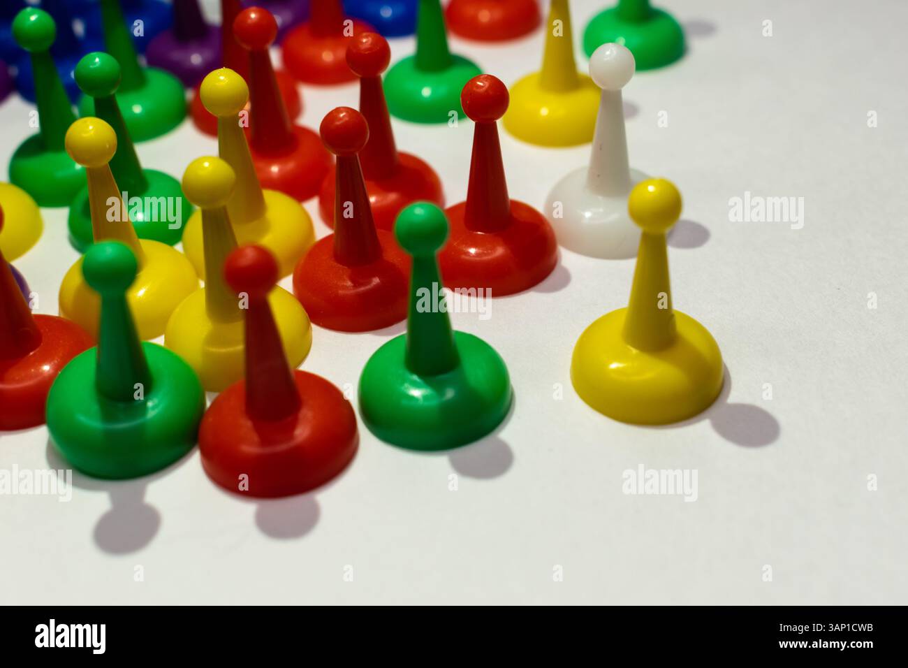 Colorful pawns isolated on white background Stock Photo - Alamy