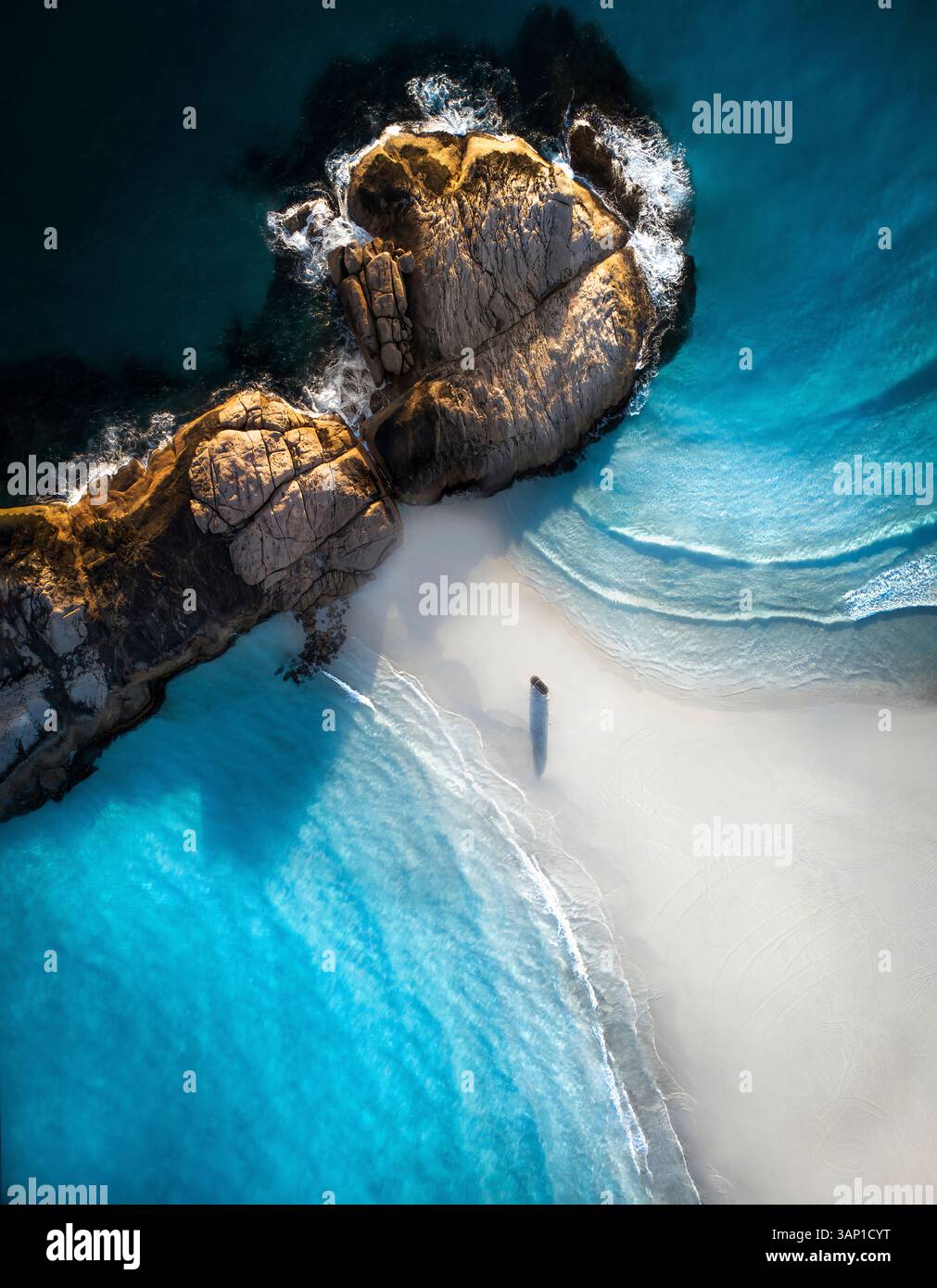Aerial view of pristine Wylie Bay beach with turquoise water and rocky ...