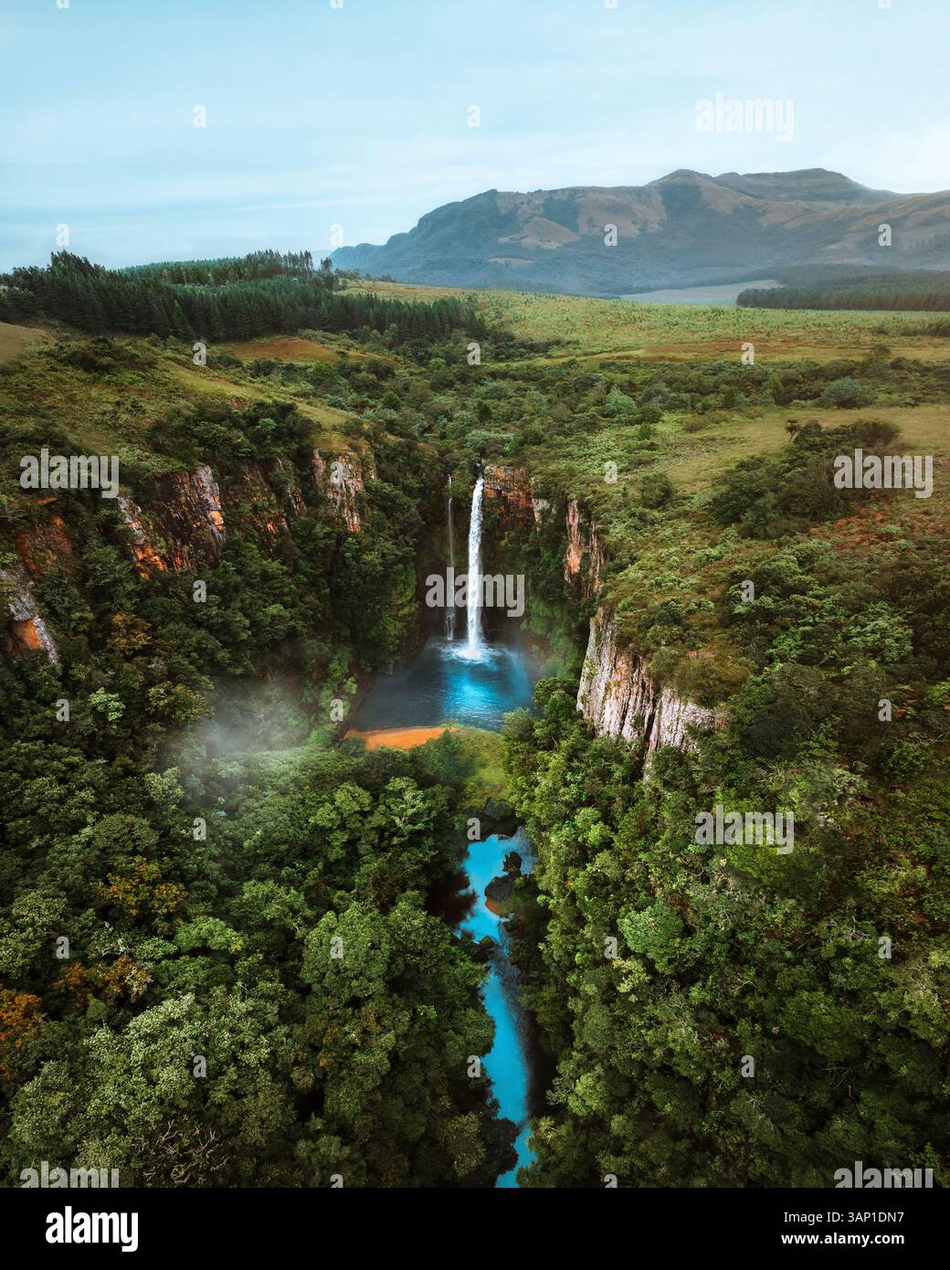 Aerial view of lush green rainforest with Mac Mac Falls, Thaba Chweu NU ...
