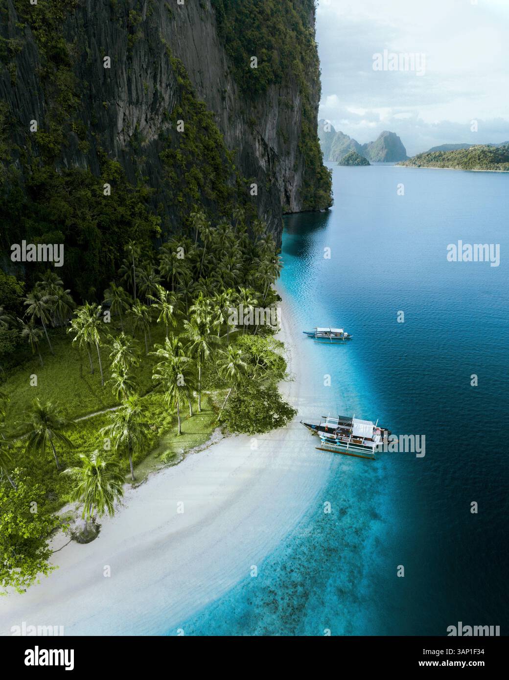 Aerial view of catamarans boat along the shoreline at Pinabuyutan ...
