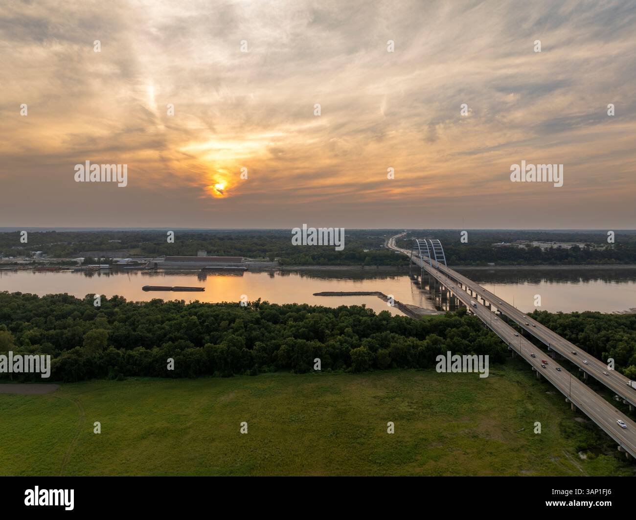 Aerial view of a tranquil sunset over the Mississippi River with a ...