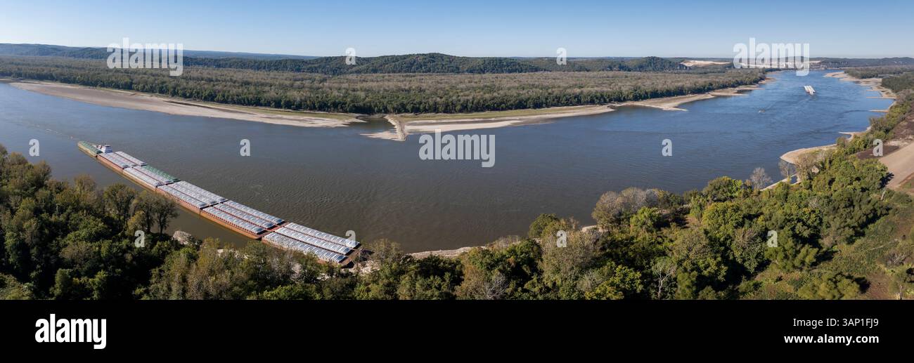 Aerial view of the serene Mississippi River panorama with barge traffic ...